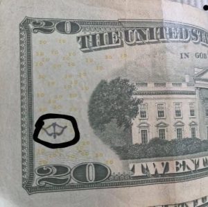 The Hidden Story Behind the Bow-and-Arrow Symbol on Your $20 Bill ...
